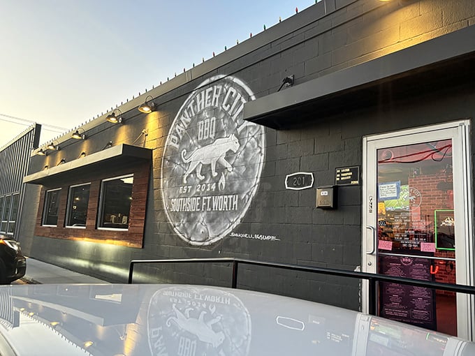 Panther City BBQ's cool logo glows against the night sky. From food truck to Fort Worth favorite—a true Texas success story.
