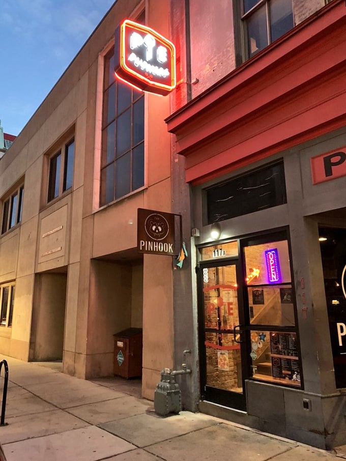 Downtown Durham's pizza rebel! Pie Pushers' unassuming glass door entrance is like finding the secret password to flavor town.