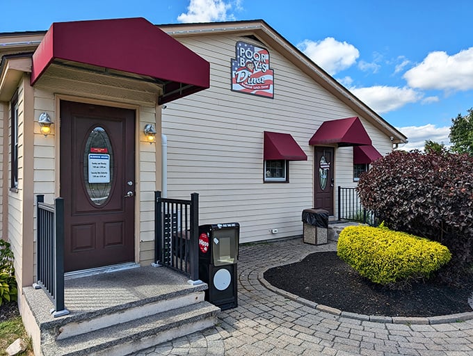 Poor Boy's Diner may look unassuming, but that doorway leads to breakfast paradise—no fancy passport required!