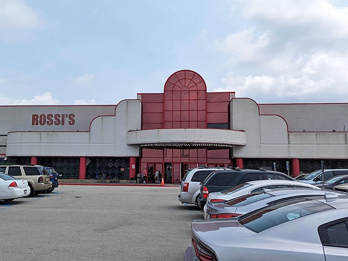 Flea market or treasure museum? Vendors display their wares in the parking lot outside Rossi's distinctive red and white building.