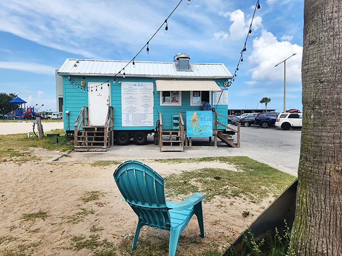 That Adirondack chair isn't just for show—it's the perfect throne for enjoying Sea Level's oceanside hot dog masterpieces.