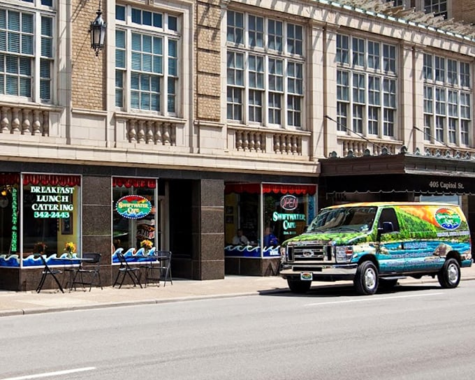 Swiftwater's colorful storefront brightens downtown Charleston like a breakfast beacon. That van's paint job alone tells you this place has personality!
