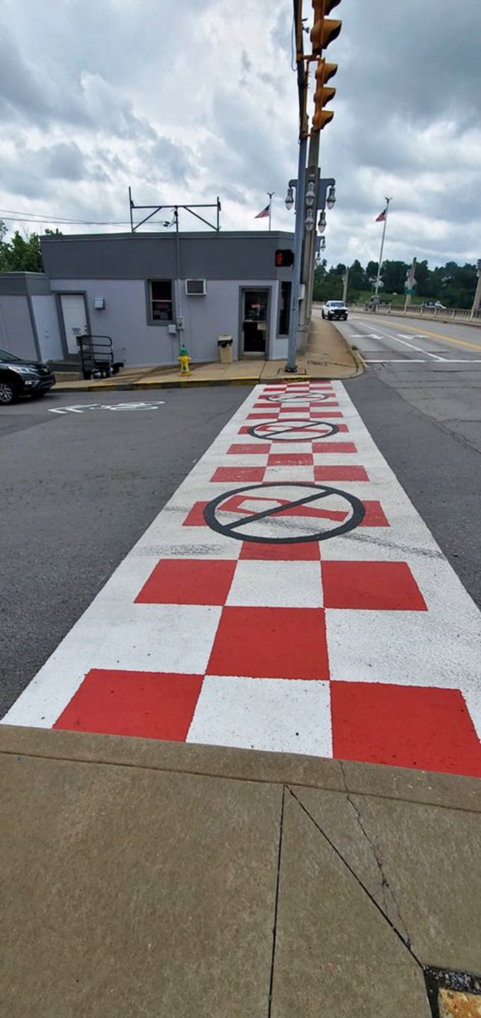 Yann's red and white checkerboard walkway is the yellow brick road for hot dog enthusiasts – follow it to flavor paradise!