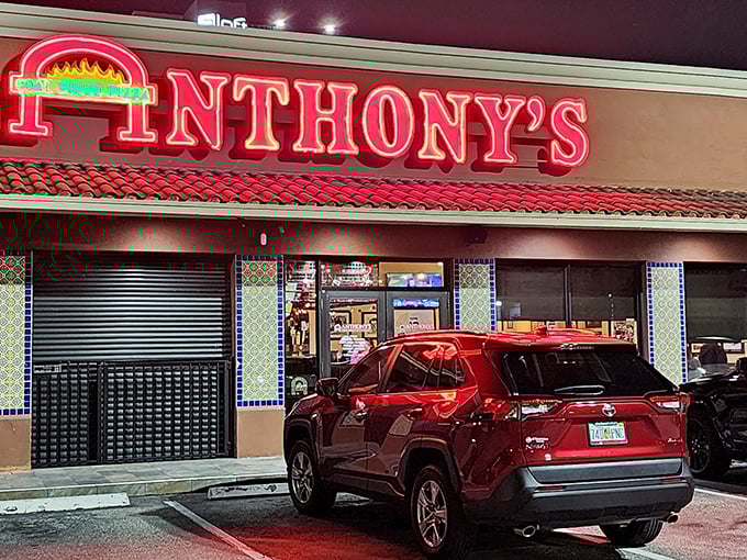 That red neon glow means serious pizza business is happening inside this Fort Lauderdale gem.