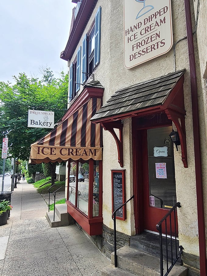 A striped awning and old-world charm frame Bredenbeck’s Bakery, where ice cream cones and fresh pastries turn every visit into a timeless treat.