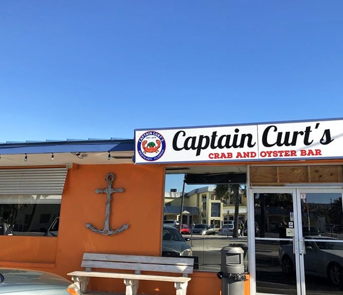 That crab on the sign isn't just cute – it's a promise of seafood done right at this Sarasota treasure.