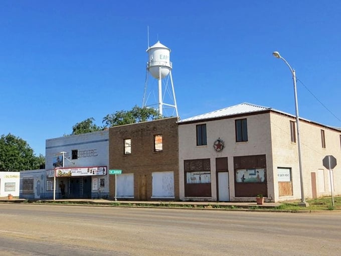 The water tower in Earth stands tall against an endless Texas sky, marking a town where affordable homes come with million-dollar views.