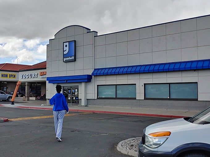 Someone's walking toward their next great find at Goodwill. Every entrance is the beginning of a treasure hunt with no map needed.