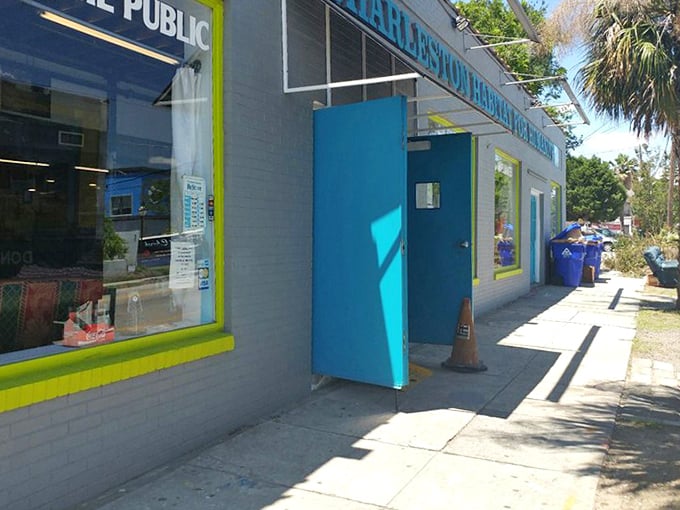 Bright colors and big windows invite curious shoppers into this Habitat ReStore. The blue door practically whispers, "Bargains this way!"
