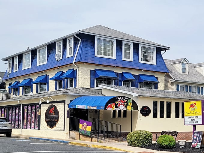Blue and cream facades invite exploration in this cozy harbor town's welcoming embrace.