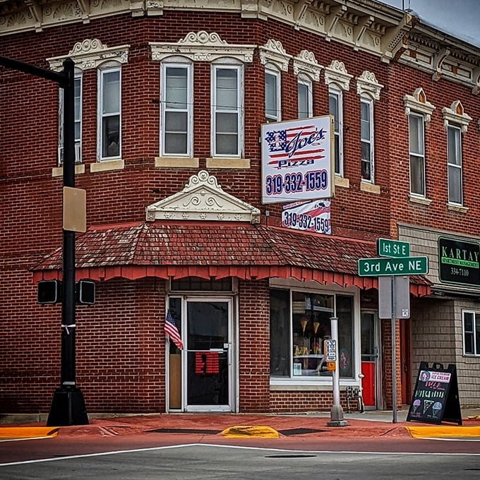 Classic brick, vintage details – Joe's Pizza looks like it belongs in a movie about hometown America. The star of the show? That pizza inside.