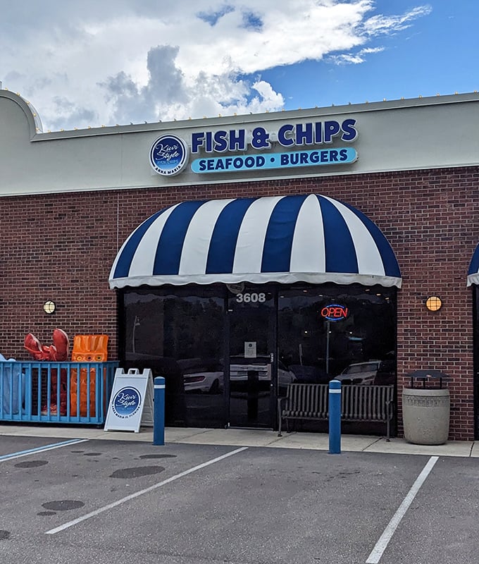 Beach vibes and Kiwi flavors create the perfect post-swim meal spot. Those blue stripes promise crispy, golden happiness inside.