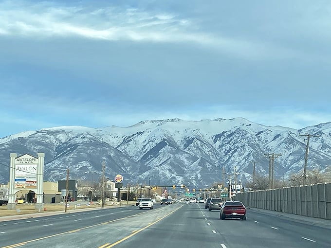 Snow-dusted mountains frame Layton's peaceful neighborhoods, where modest homes provide affordable living with spectacular scenery included free.