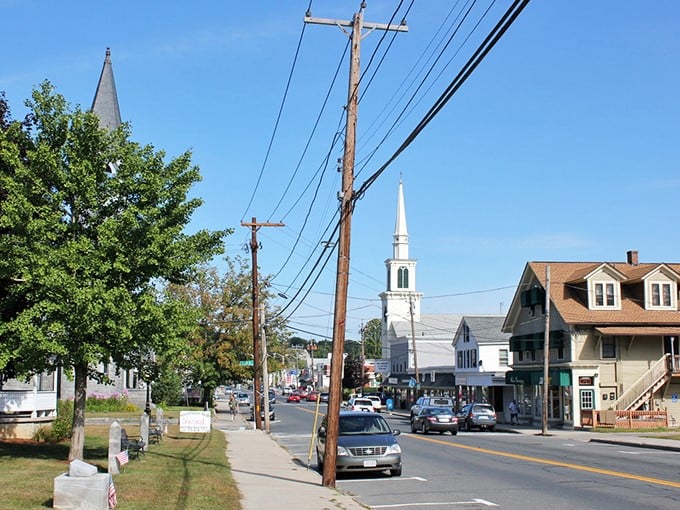 Blue skies and a white church steeple set the tone for Monson’s laid-back downtown, where everyday life unfolds at an easy New England pace.