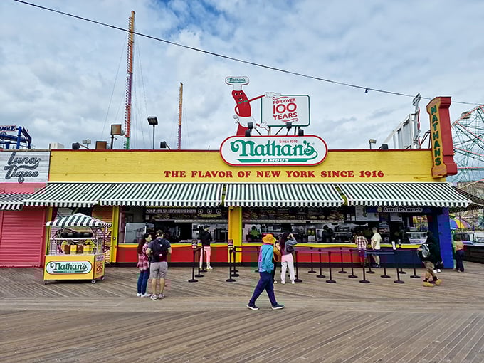 That iconic boardwalk backdrop makes every bite taste like summer vacation and childhood memories combined.