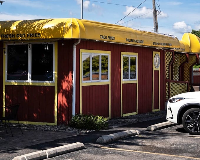 The yellow awning advertises "taco fries" - Pat's knows sometimes you need more than just a perfect dog.