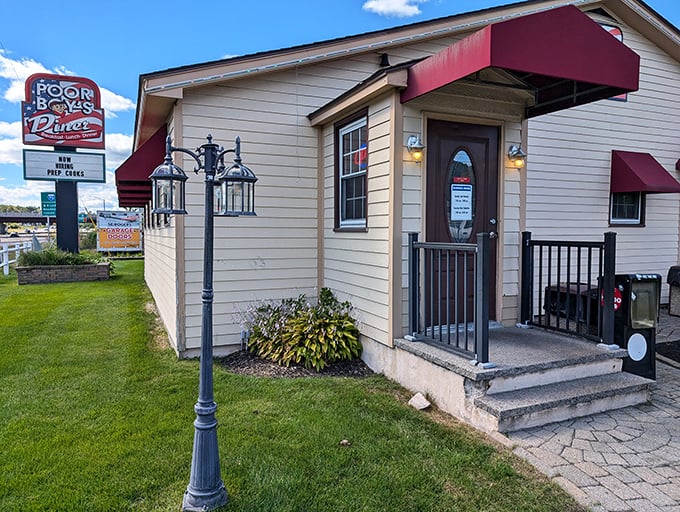 That vintage lamppost outside Poor Boy's isn't just charming—it's standing guard over some of NH's best home fries.