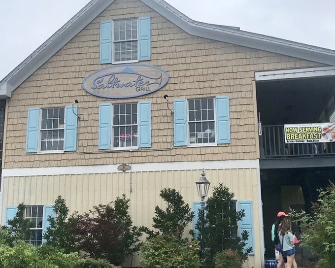 Those blue shutters and tan shingles aren't just pretty – they're Saltwater Grill's way of saying "welcome home, seafood lover."