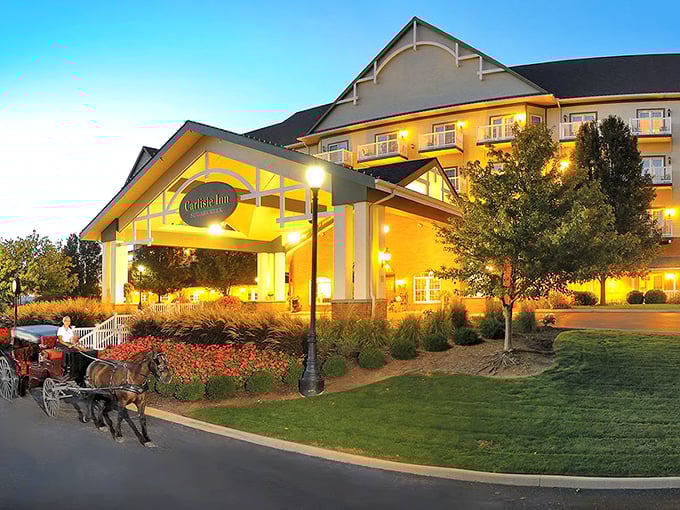 The Carlisle Inn glows warmly at dusk, promising the kind of hospitality your grandmother would approve.