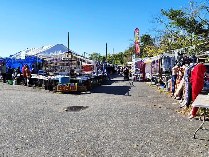 Rows of golden boots and hanging belts prove that practical shopping doesn't mean boring—quality meets affordability under these vendor tents.