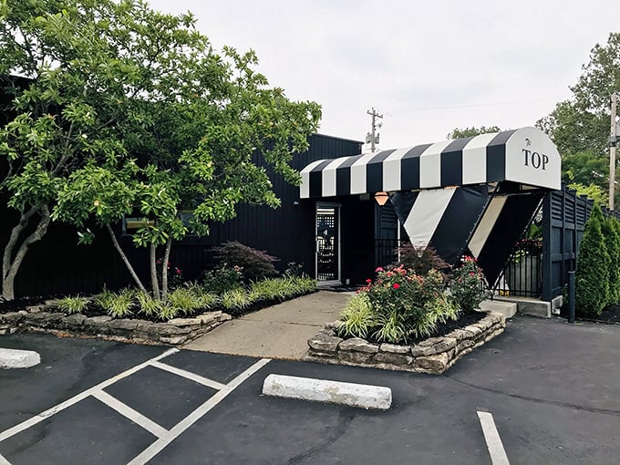 Classic steakhouse architecture meets modern landscaping - where serious beef meets serious style.