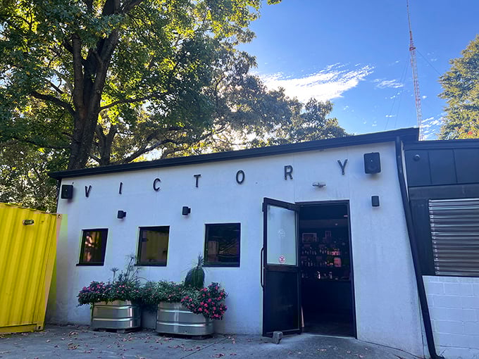Industrial-chic meets comfort food at Victory's outdoor seating area. Those string lights will illuminate your journey through their creative mini sandwich menu.