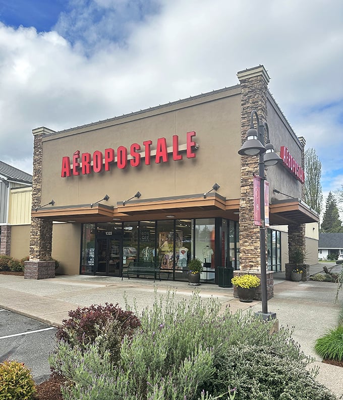 Aéropostale's storefront showcases that perfect blend of Pacific Northwest aesthetics and teenage fashion dreams, all at clearance prices.