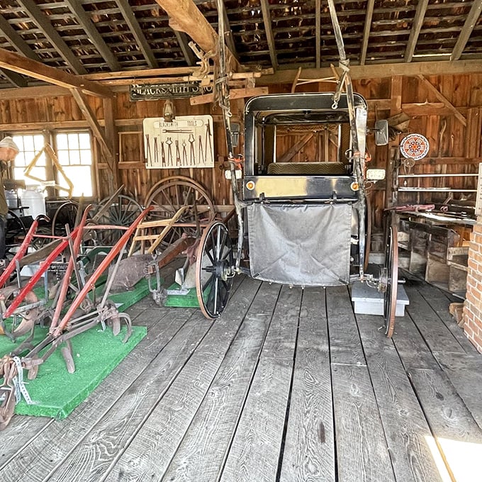 The blacksmith shop showcases the craftsmanship that built America—tools hanging like artifacts from a time when "handmade" wasn't a premium upgrade option.