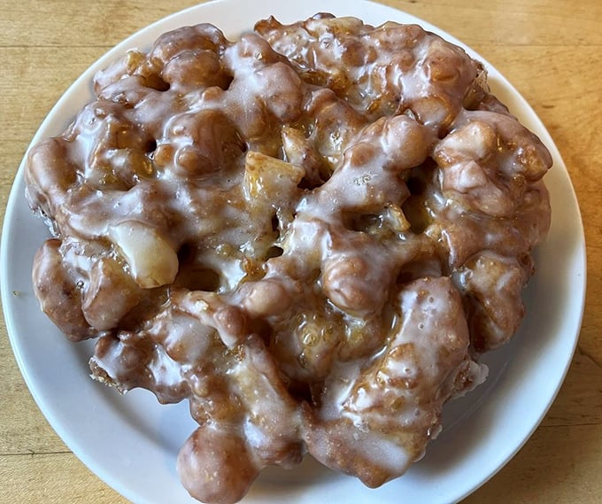The apple fritter looks like it had a wild night out – deliciously disheveled, glazed, and absolutely worth every calorie-laden bite.