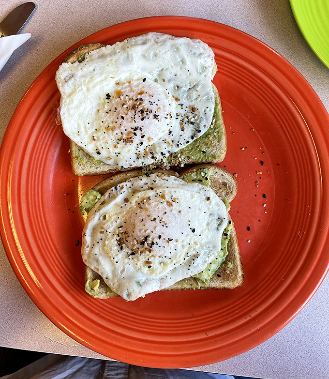 Avocado toast that proves this small-town Ohio eatery isn't stuck in the past—perfectly fried eggs atop creamy avocado create breakfast harmony.