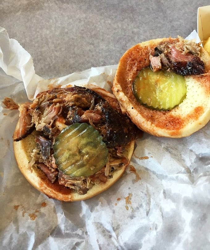 The BBQ sandwich comes with pickles that aren't just garnish – they're essential supporting actors in this smoky, savory production.