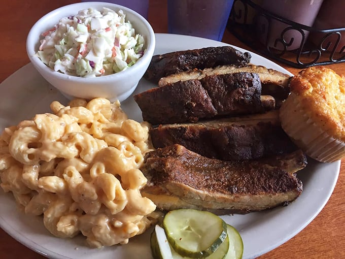 Ribs, mac and cheese, coleslaw, and cornbread—the Mount Rushmore of BBQ sides supporting those perfectly smoked bones.
