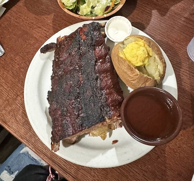 These baby back ribs don't need a jingle—they speak for themselves with a bark so beautiful it deserves its own Instagram account.