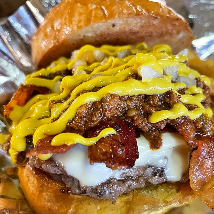 This bacon cheeseburger means business with its mustard drizzle and foil wrapper promising zero pretension, maximum satisfaction.