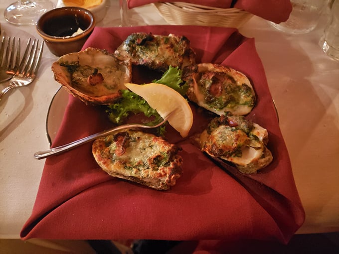 Baked oysters that look like they've been dressed for the opera—rich, decadent, and making you wonder why you'd ever eat them any other way.