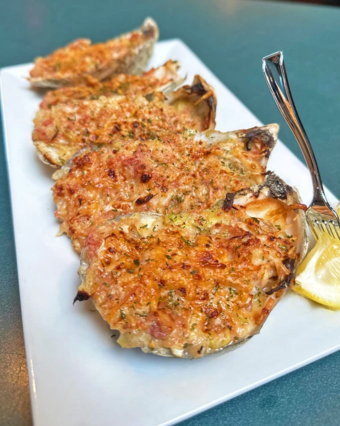 These baked oysters aren't just seafood—they're little boats of joy sailing on waves of Jameson butter, breadcrumbs, and parmesan cheese.