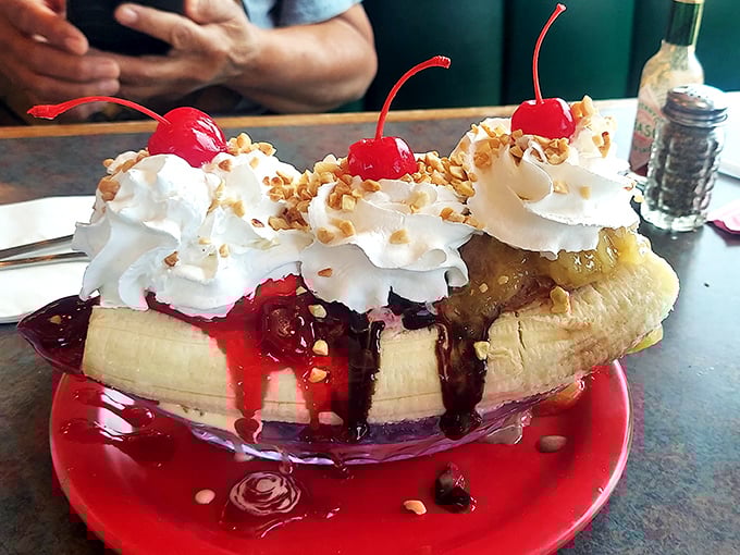 Behold the banana split – a dessert that doesn't just satisfy your sweet tooth, it throws a parade for it with whipped cream floats and cherry drum majors.