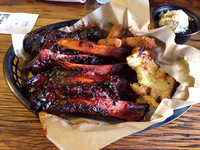 Behold the barbecue equivalent of a standing ovation. These ribs don't just fall off the bone—they make a graceful exit after a spectacular performance.
