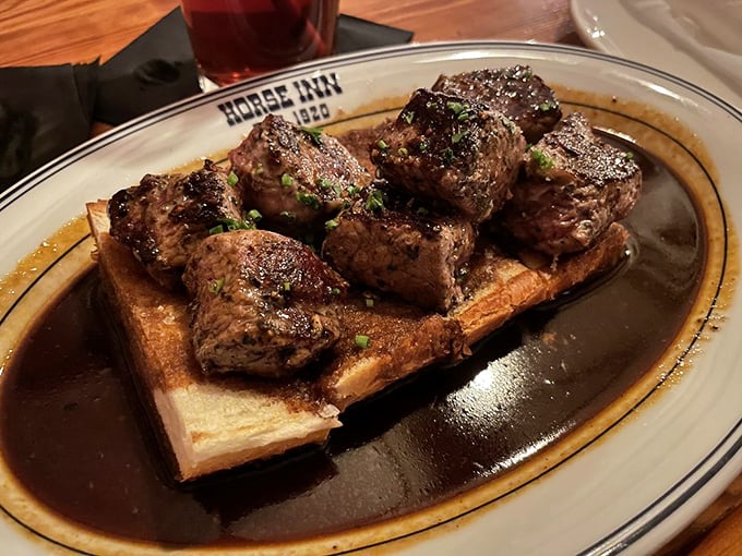 Beef tips on toast – because sometimes the simplest presentations pack the biggest flavor punches.