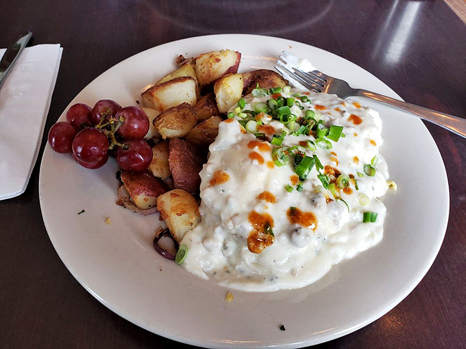 This isn't just breakfast—it's comfort reincarnated as biscuits and gravy. The kind of dish that makes you want to hug the chef and adopt their family.