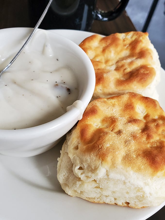 These biscuits aren't just made from scratch—they're made with conviction. The gravy looks like it's been simmering since yesterday, in the best possible way.