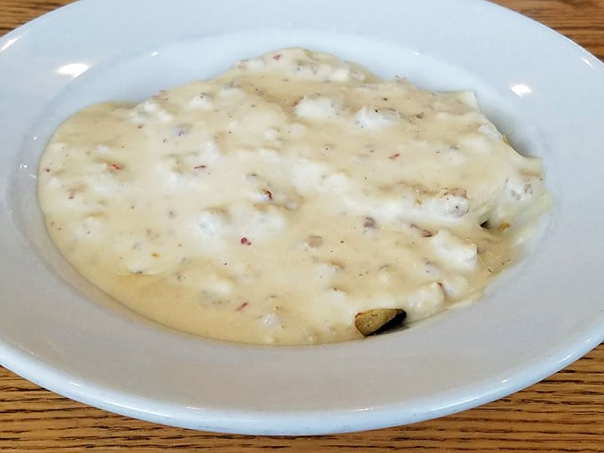 Creamy, dreamy biscuits and gravy that would make your Southern grandmother nod in approval—comfort food that hugs you from the inside.