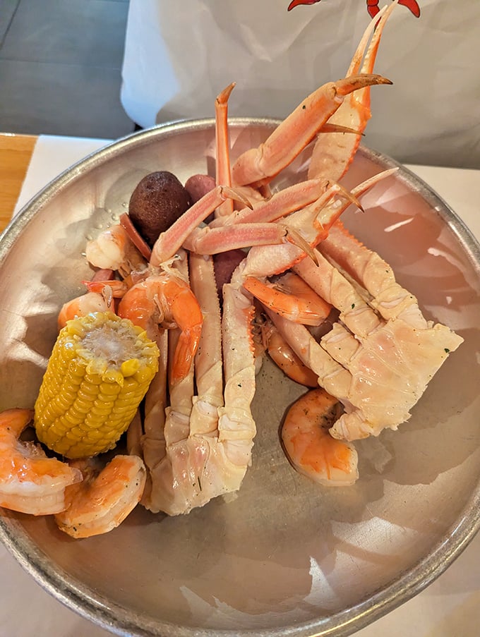 Snow crab legs arranged like nature's perfect puzzle—crack, dip, savor, repeat until your seafood dreams are thoroughly satisfied.