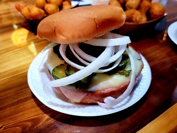 The legendary bologna sandwich in all its glory – thick-cut meat, melty cheese, crisp pickles, and onions on a soft bun. Bologna's redemption story.