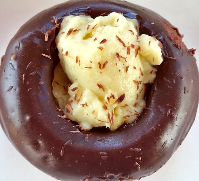 Chocolate exterior, custard soul – this Boston cream is the dessert equivalent of finding out your blind date looks like Paul Newman and cooks like Julia Child.