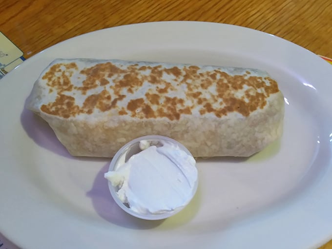 This breakfast burrito isn't just a meal, it's a commitment – one that rewards your dedication with every cheese-filled, tortilla-wrapped bite.