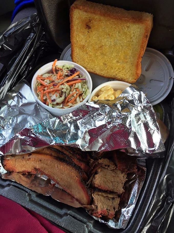 Brisket with that perfect smoke ring and Texas toast proving Cincinnati understands low-and-slow smoking just as well as anyone.