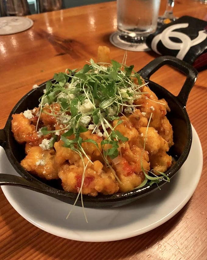 Buffalo cauliflower "wings" that might just convert the most dedicated chicken wing enthusiast—crispy, saucy, and absolutely no bones about it.