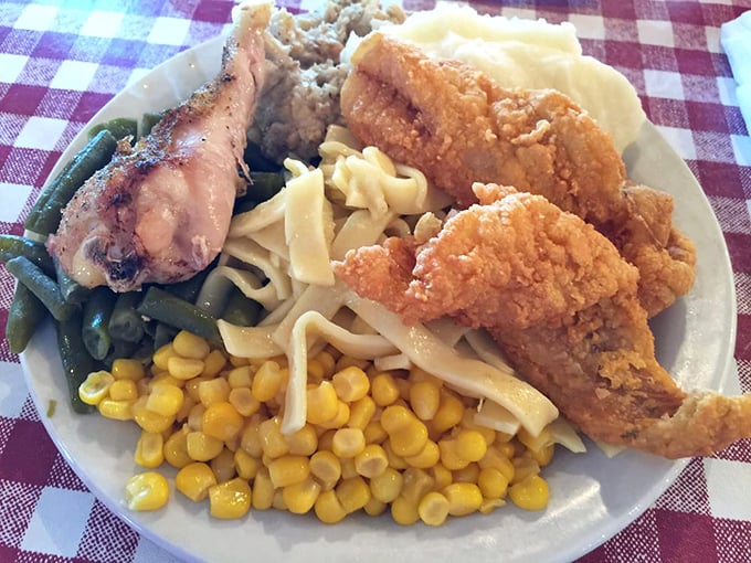 A plate that tells the story of American comfort food better than any cookbook—where vegetables are merely supporting actors to the crispy chicken stars.