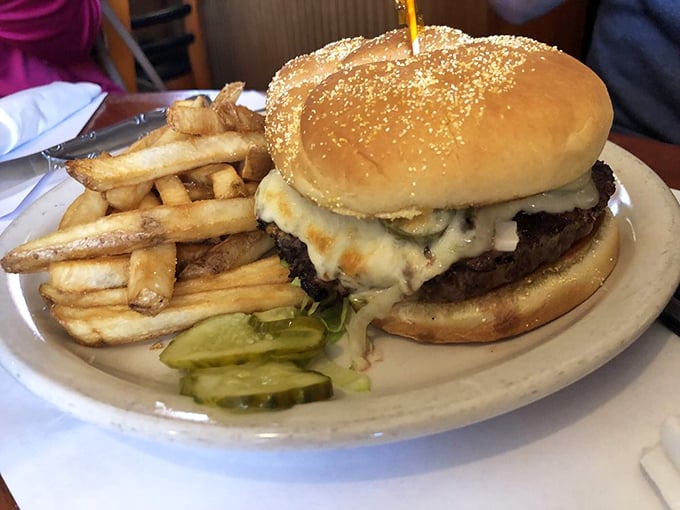 This burger means business – no fancy garnishes, just pure beefy bliss between perfectly toasted buns.